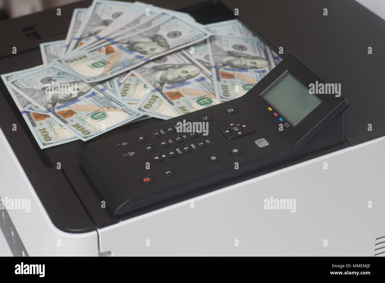 Printer and dollar bills money close up Stock Photo - Alamy