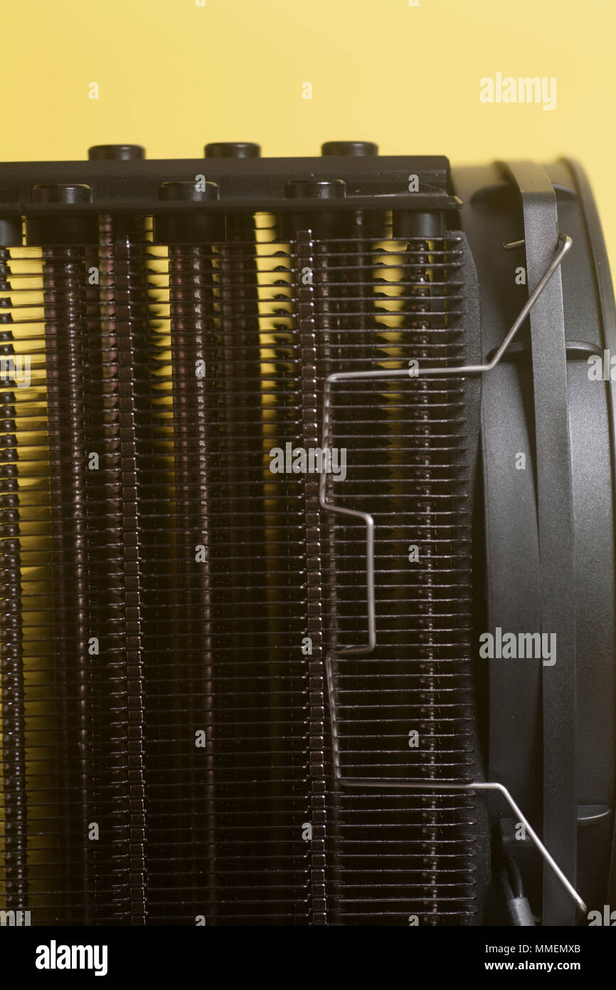 CPU fan processor cooler on a yellow background Stock Photo - Alamy