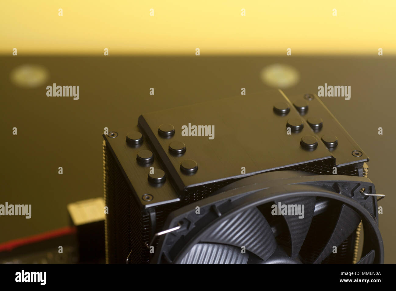 CPU fan processor cooler on a yellow background Stock Photo - Alamy