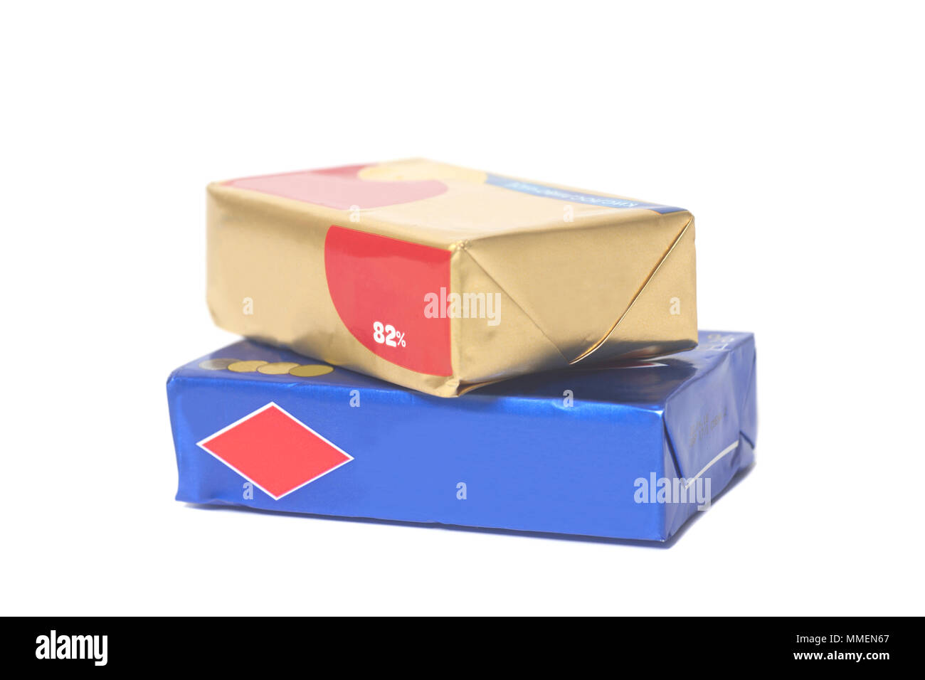 Sticks of wrapped butter isolated on white background Stock Photo - Alamy