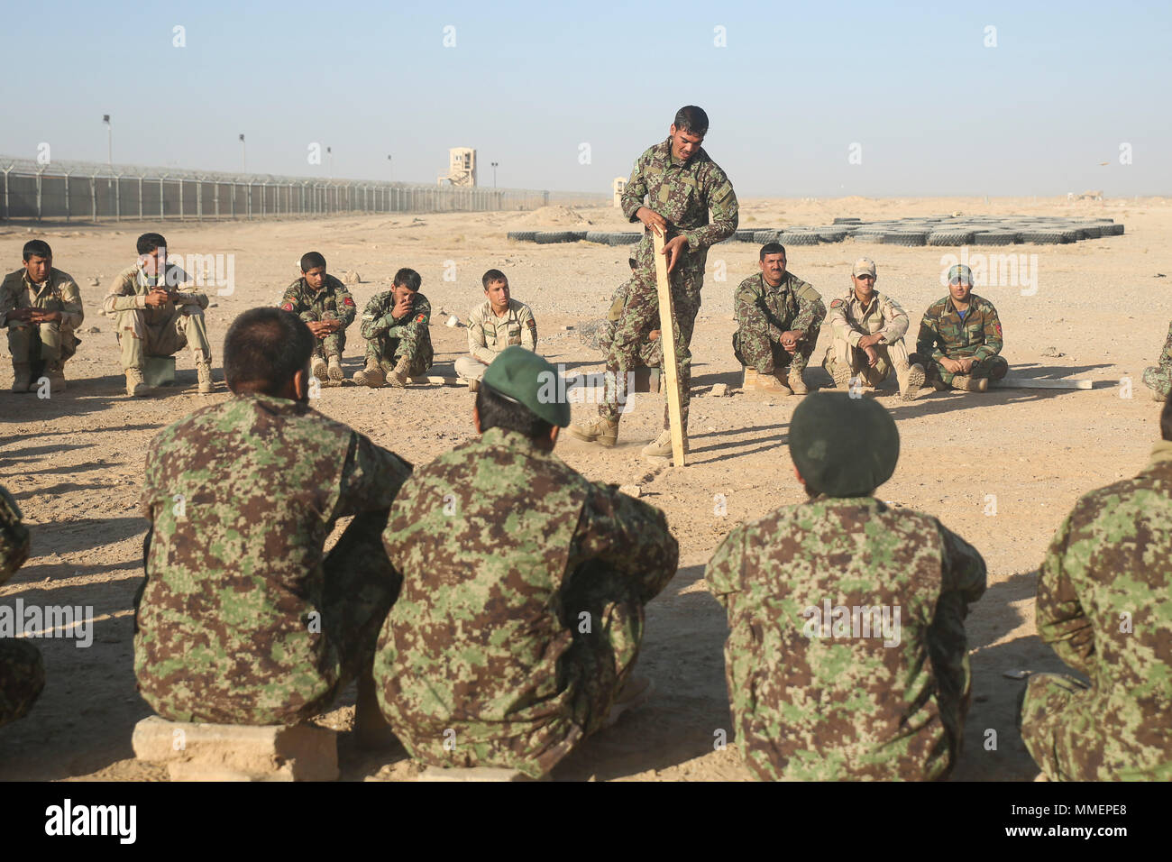 An Afghan National Army soldier with 215th Corps demonstrates proper ...