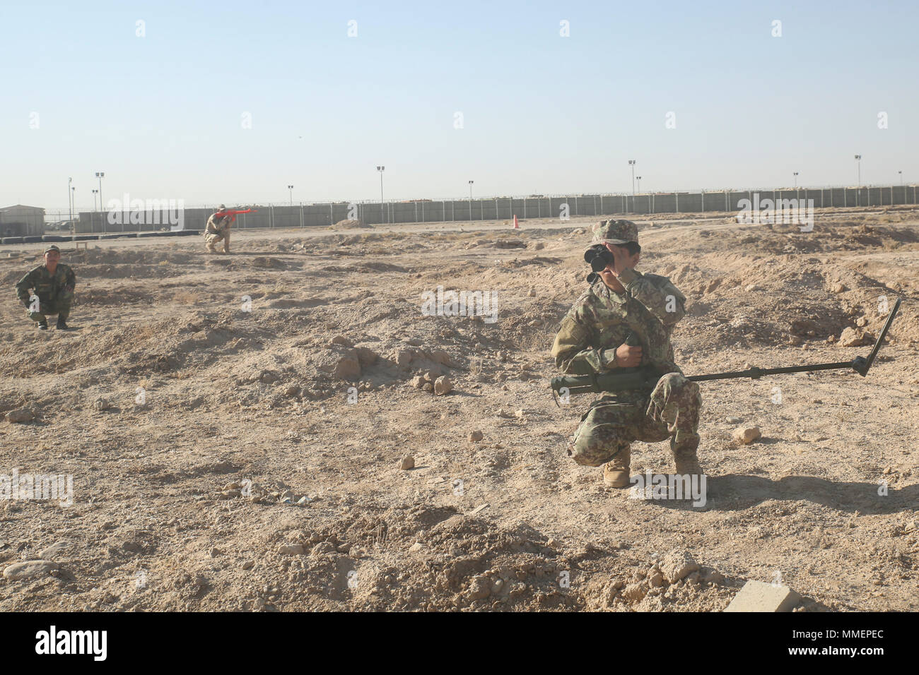 An Afghan National Army soldier with 215th Corps looks for indicators ...