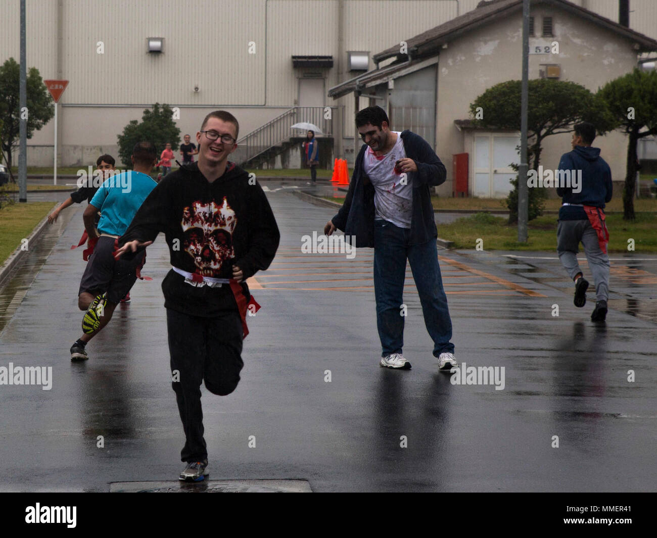 People Running Away From Zombies