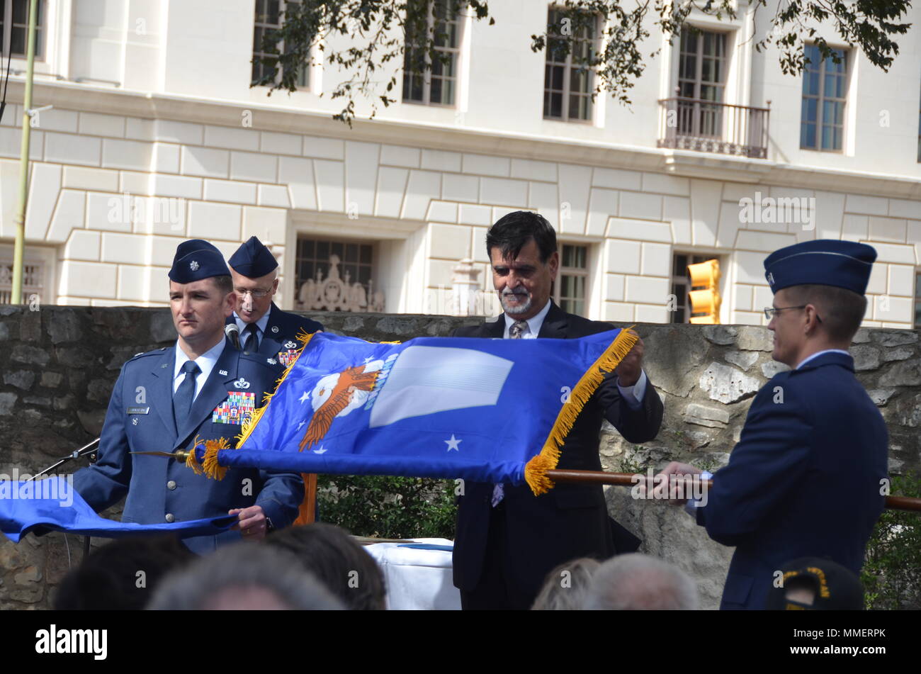 Air Force Civil Engineer Center Director Randy E. Brown assists the ...