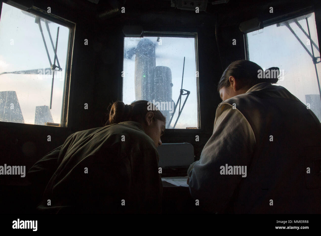 U.S. Marine Corps Gunnery Sgt. Carmen Christman, right, a logistics ...