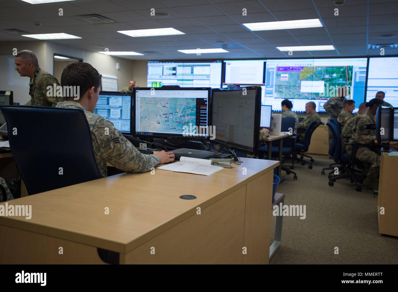 Members of the Oklahoma Army and Air National Guard assigned to the ...