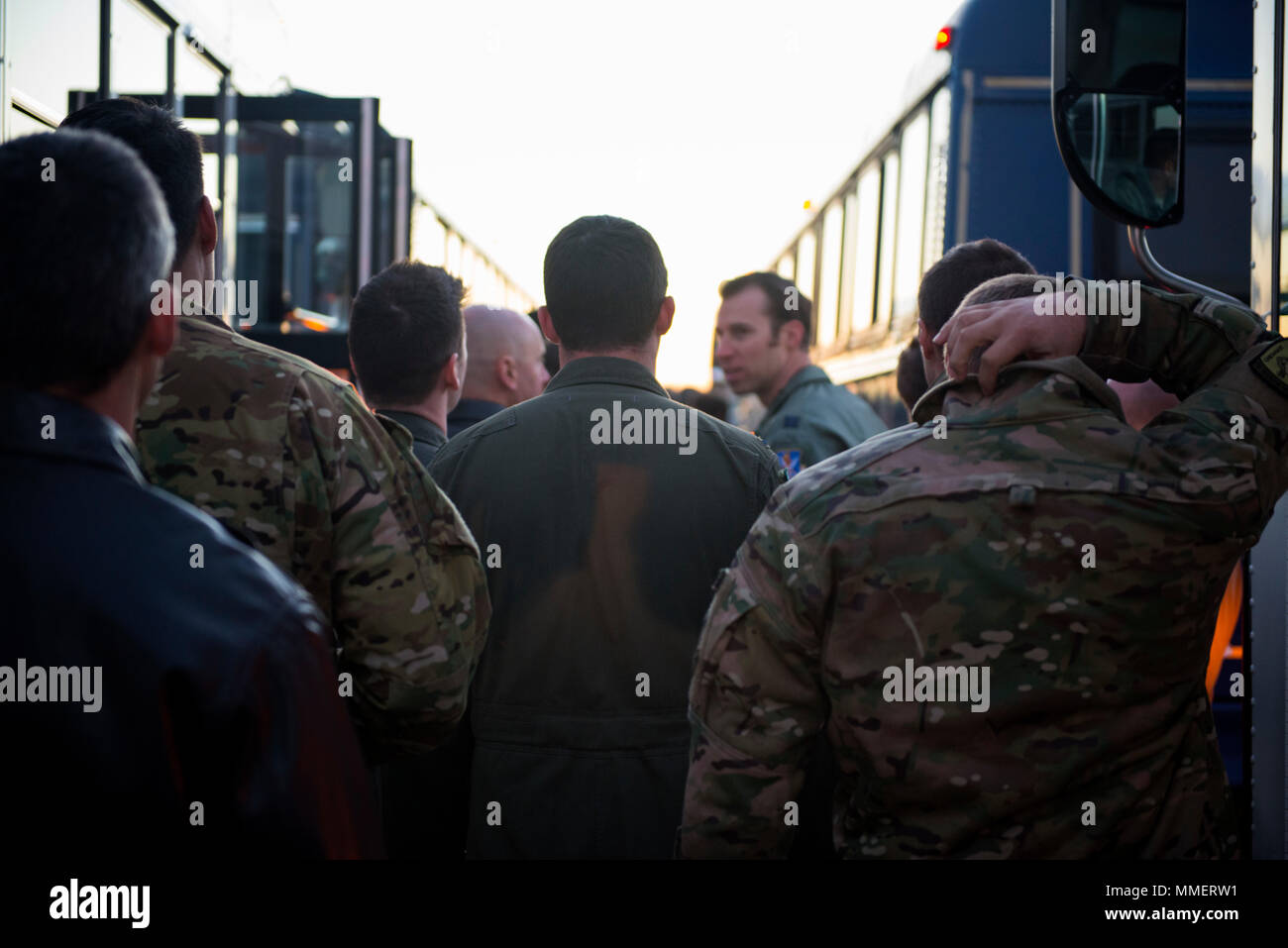 Airmen get ready to board the buses used during a foreign object debris ...