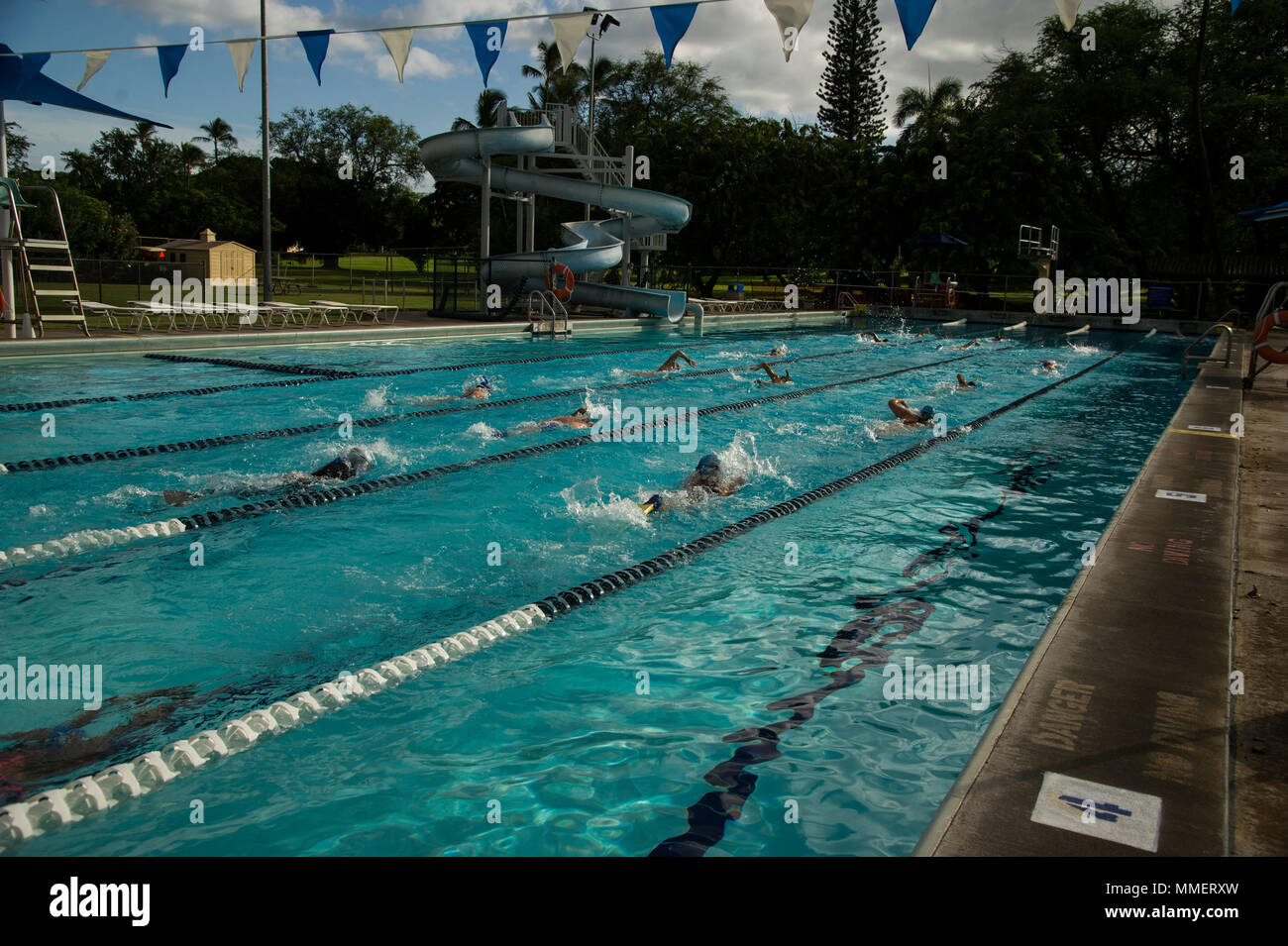 Members of the Hickam Hurricanes free style swim during practice warm ...