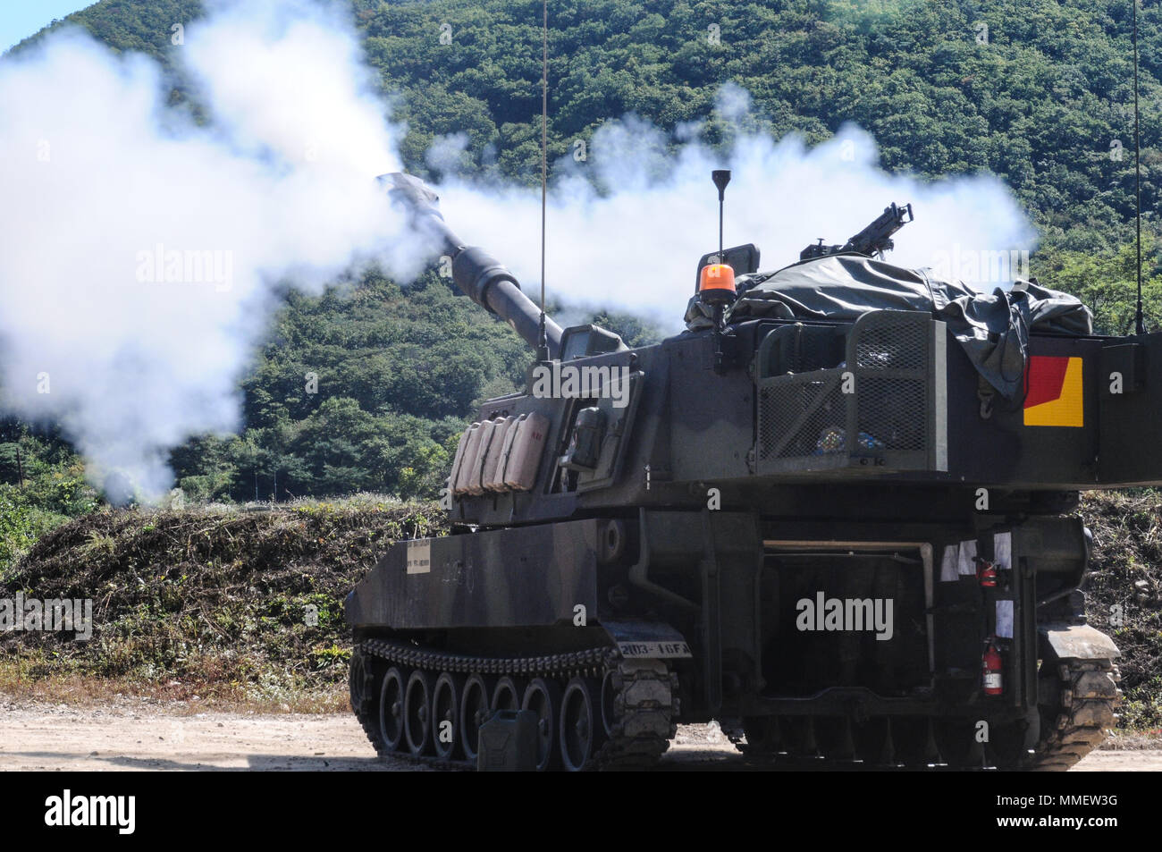An M109 Paladin fires during a live fire exercise for 3rd Battalion ...