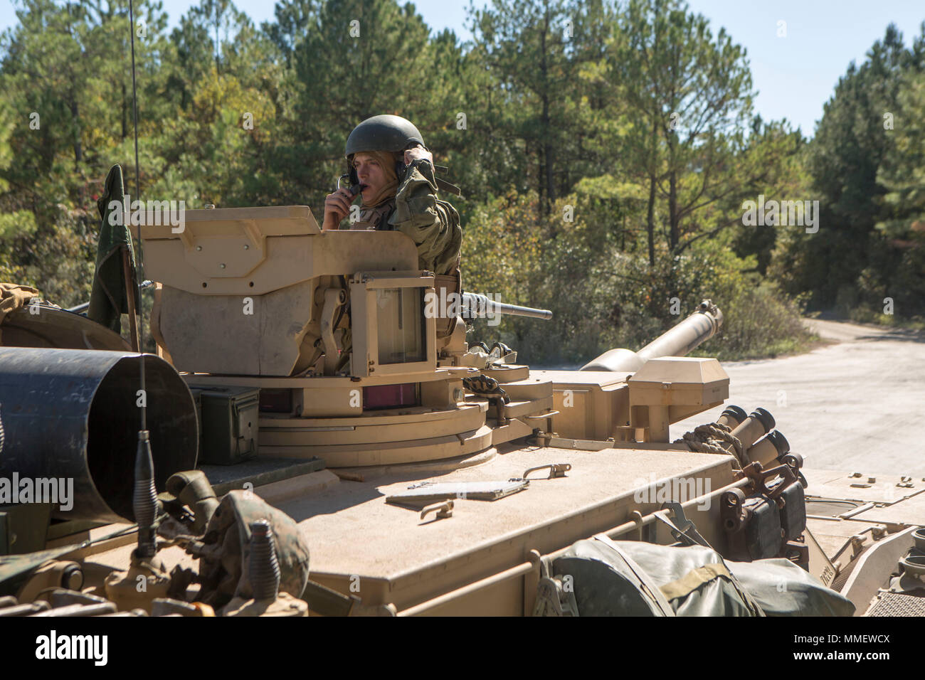 1st Lt. Luis Penichet communicates with the control tower during a tank ...