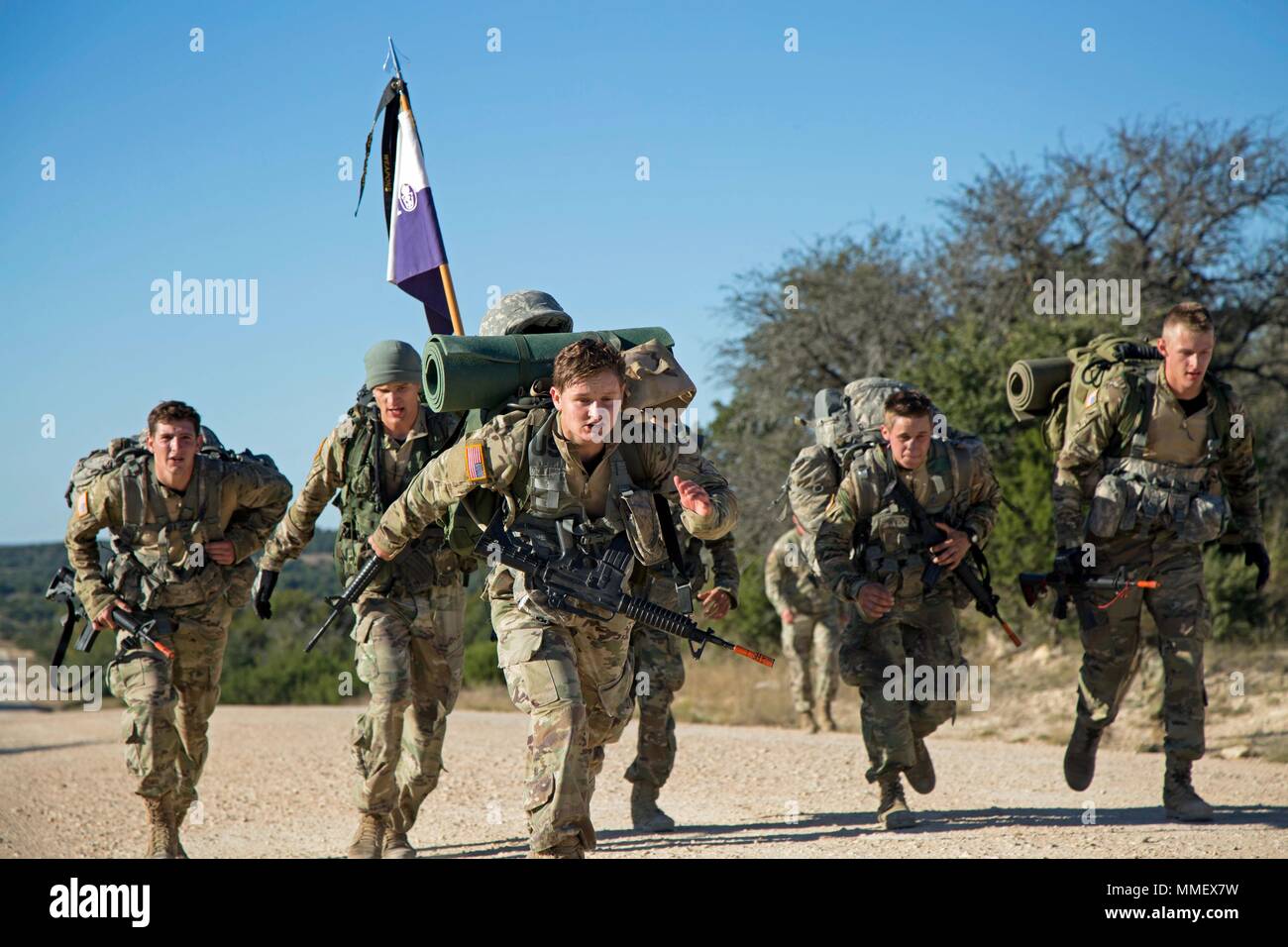 Tarleton State University cadets cross the finish line during the 10 ...