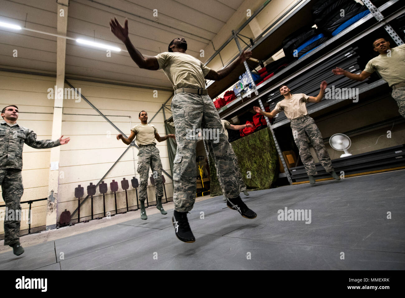 U.S. Air Force Staff Sgt. Kourtlyn Stafford, center, 52nd Security ...