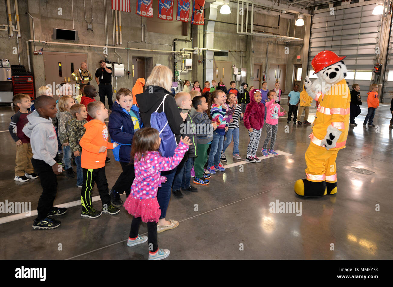 Sparky the fire dog greets 1st graders October 12 inside the Offutt Air ...