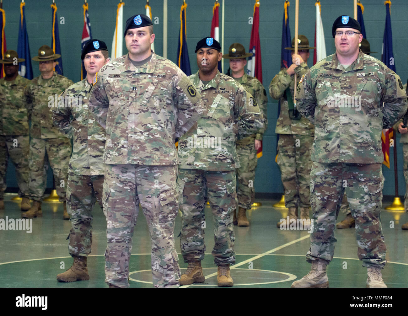 Members of Task Force Marshall stand at parade rest while waiting for ...