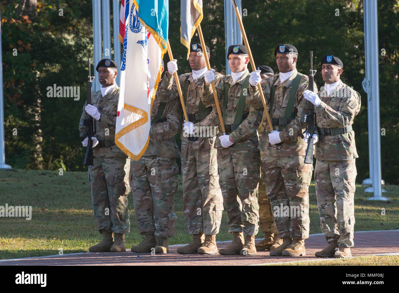 The Soldier Support Institute color guard salutes during the change of ...