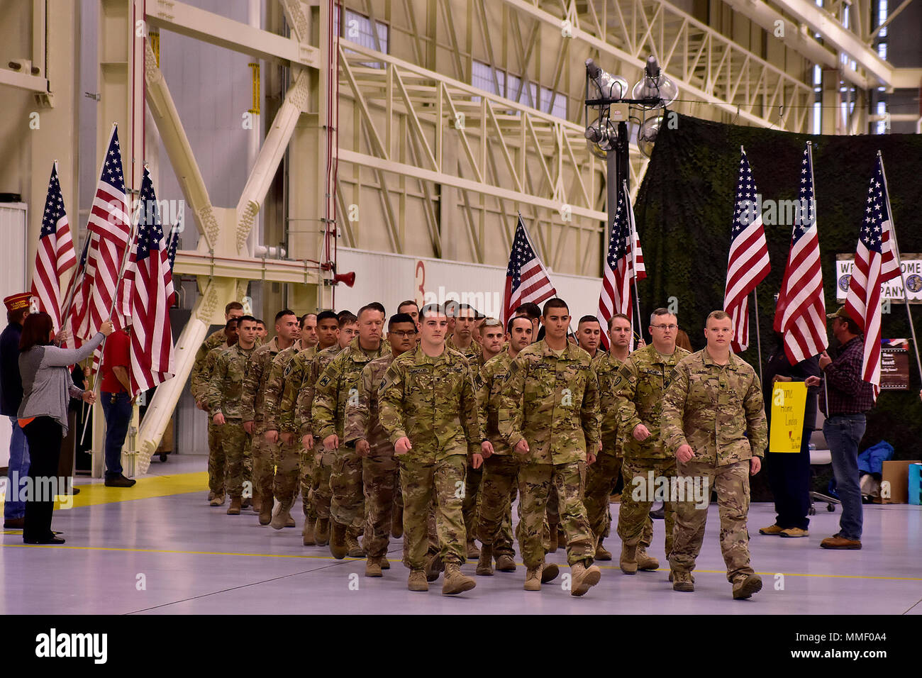 Soldiers from the 1st Battalion, 52nd Aviation Regiment march into Fort ...
