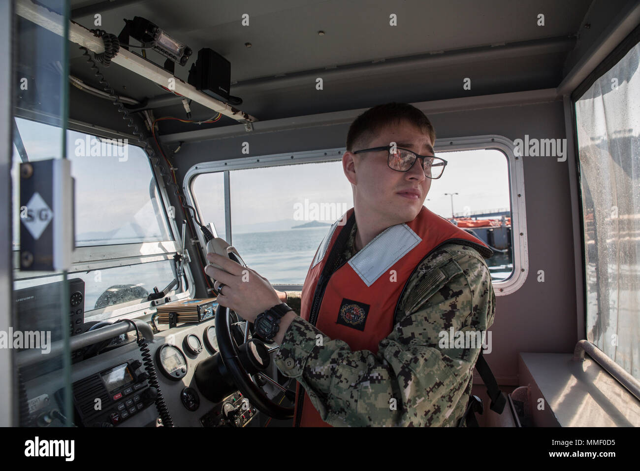 U.S. Navy Engineman 2nd Class Nicholas Montano with Headquarters ...