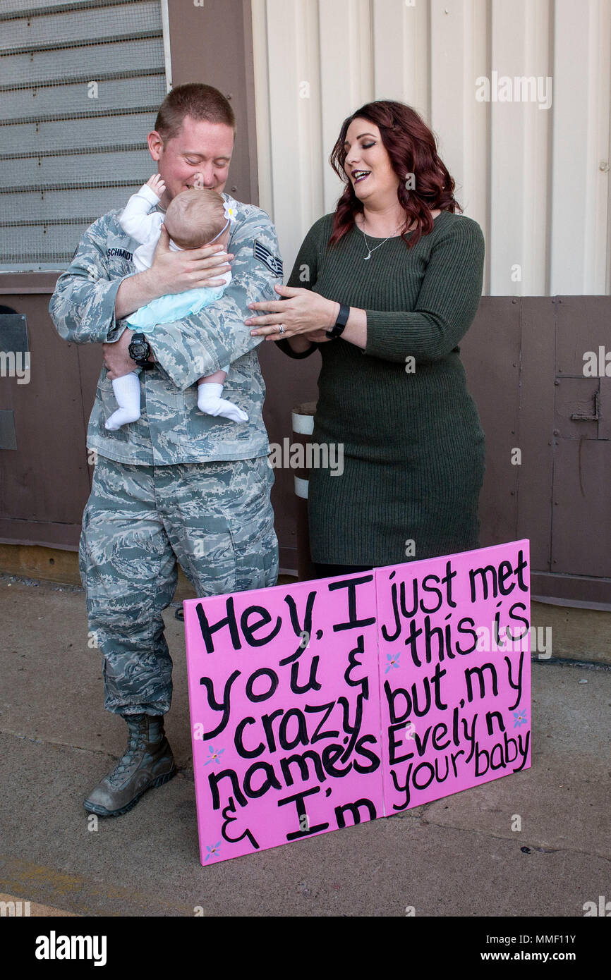Staff Sgt. Derek Schmidt, 729th Air Control Squadron, is greeted by his ...