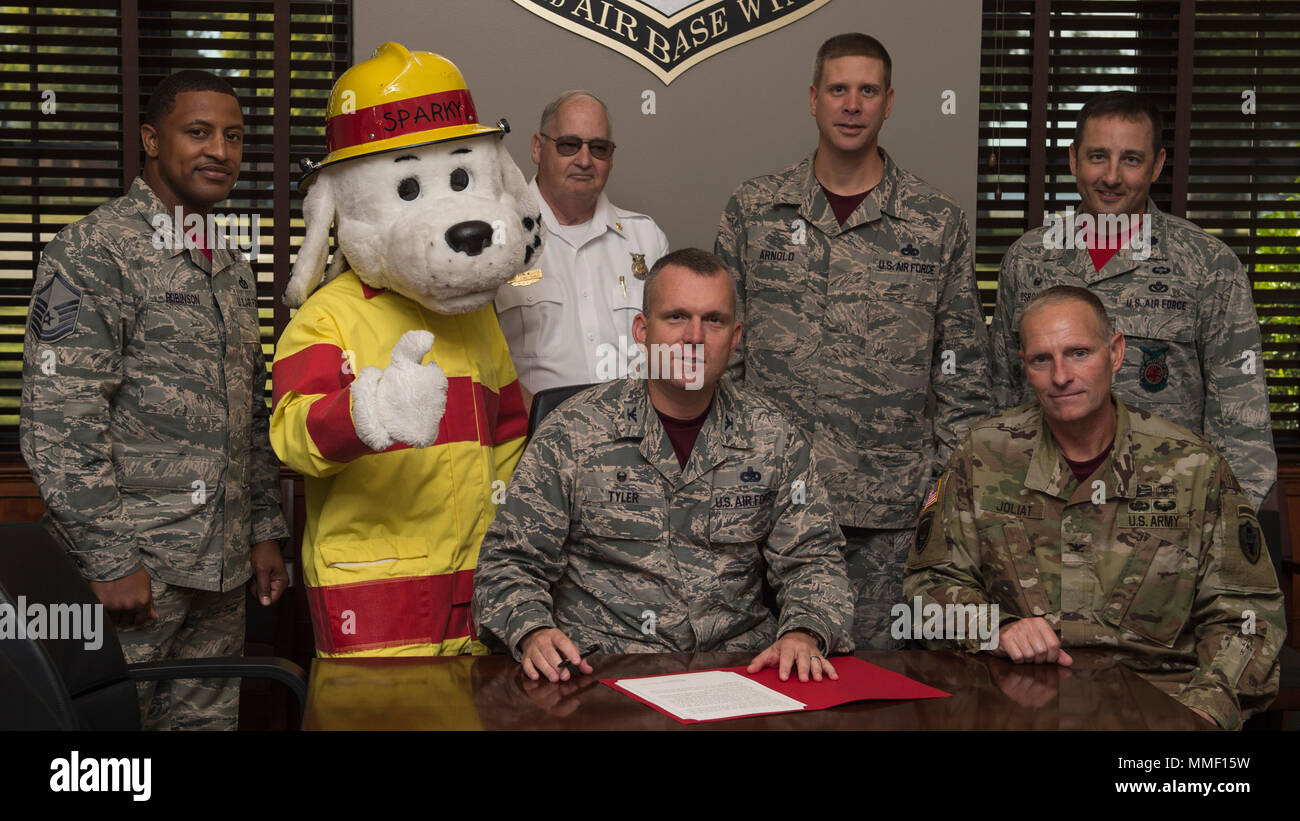 Center, U.S. Air Force Col. Sean Tyler, 633rd Air Base Wing commander ...