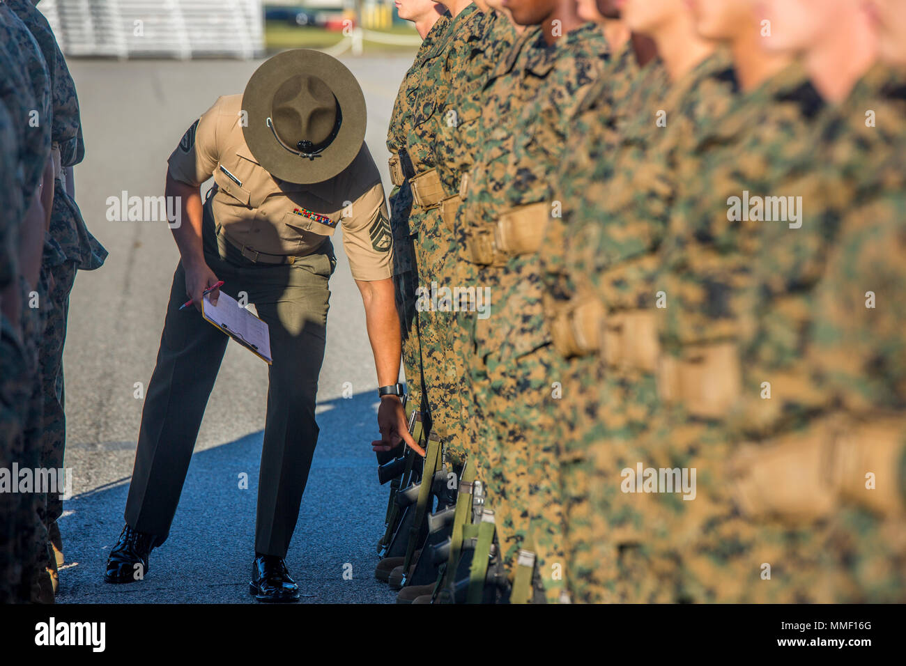 U.S. Marine Corps Staff Sgt. Devon Luevano, a Parris Island drillmaster ...