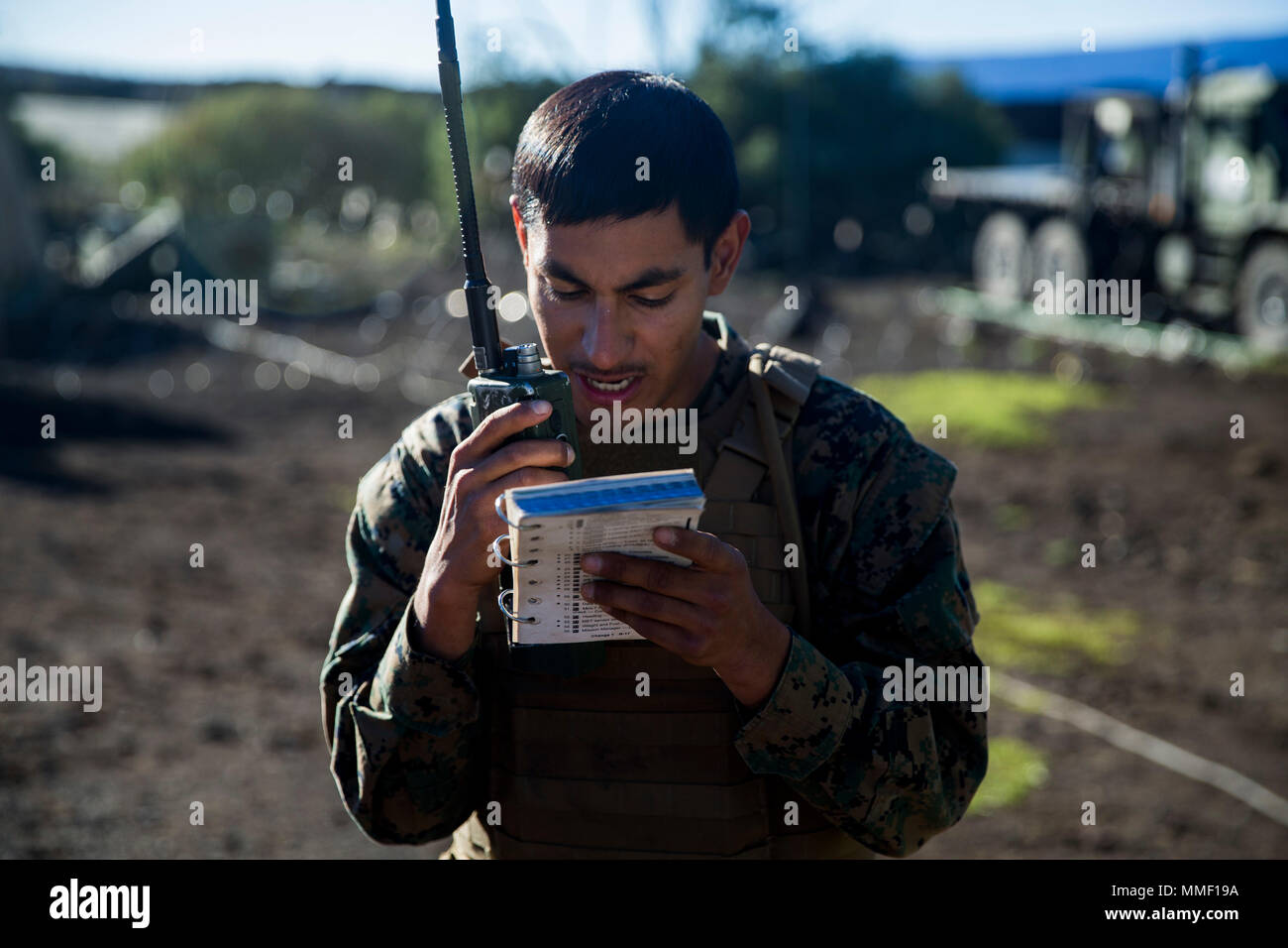 U.S. Marine Lance Cpl. Jose Reyes during preflight checks of an RQ-7B ...