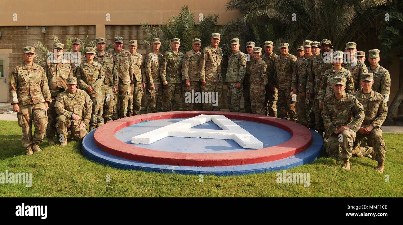 Military attorneys from Task Force Spartan gather together outside the ...