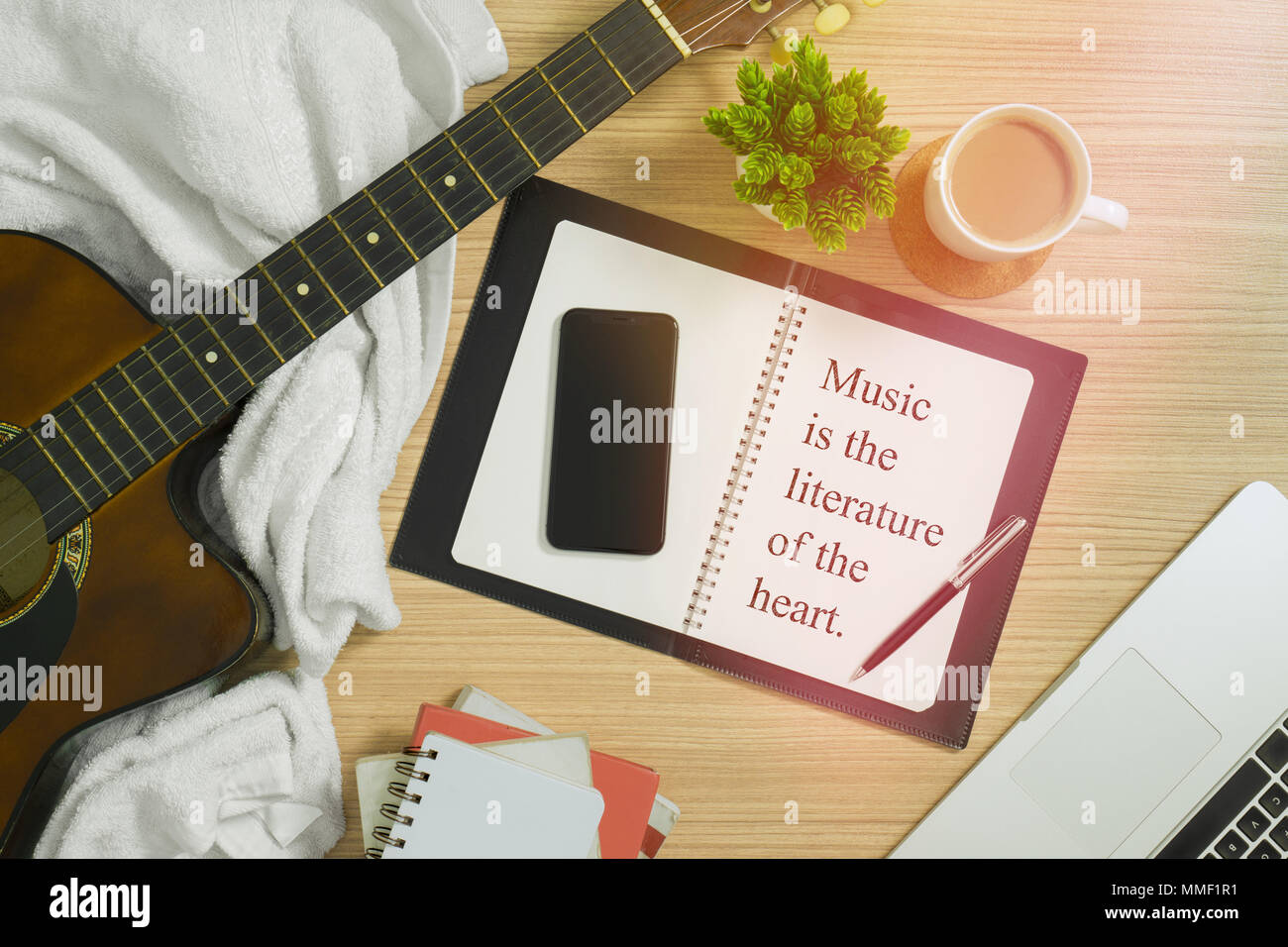 Musical quote. Music is the literature of the art Stock Photo - Alamy