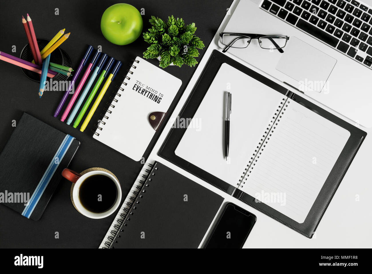 Multiple stationery items and devices for office and school. Top view ...