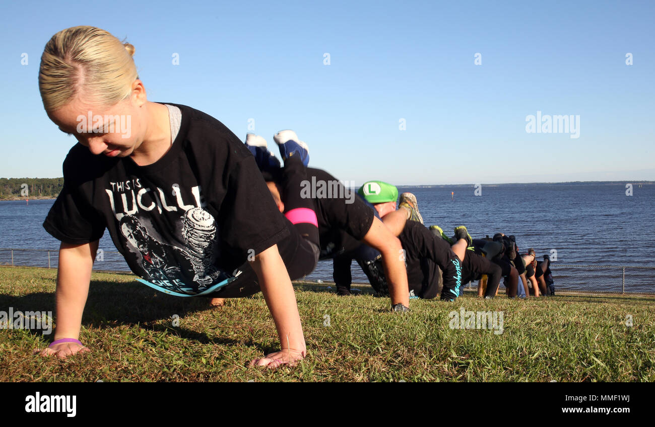 Marines participate in squad push-ups during an All Terrain Unit ...