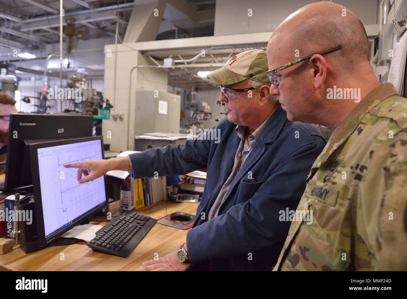 Hudson Valley Community College David Larkin, left, showing Arsenal ...