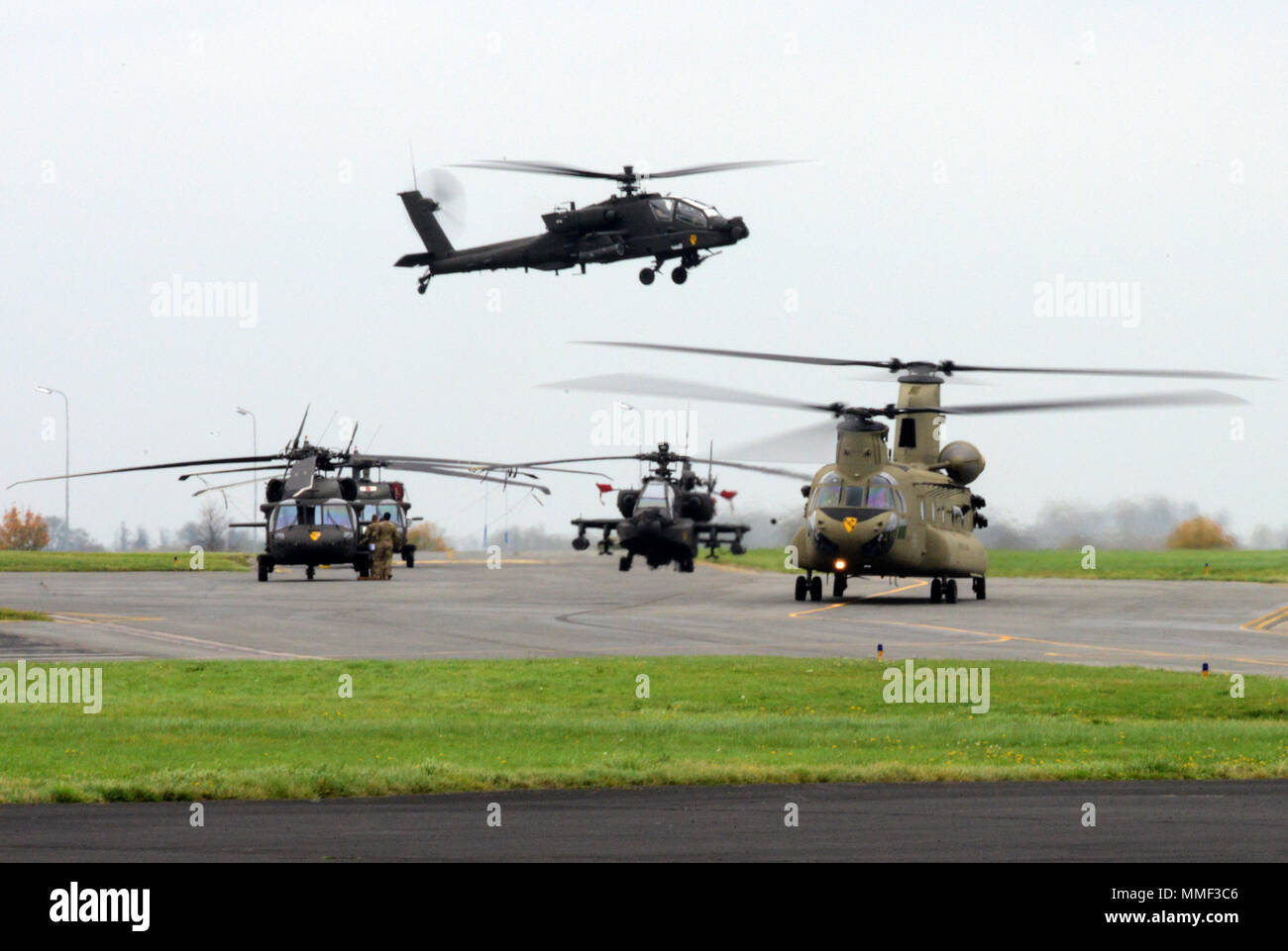 CH-47 Chinook, AH-64 Apache and UH-60 Black Hawk, assigned to 1st Air ...