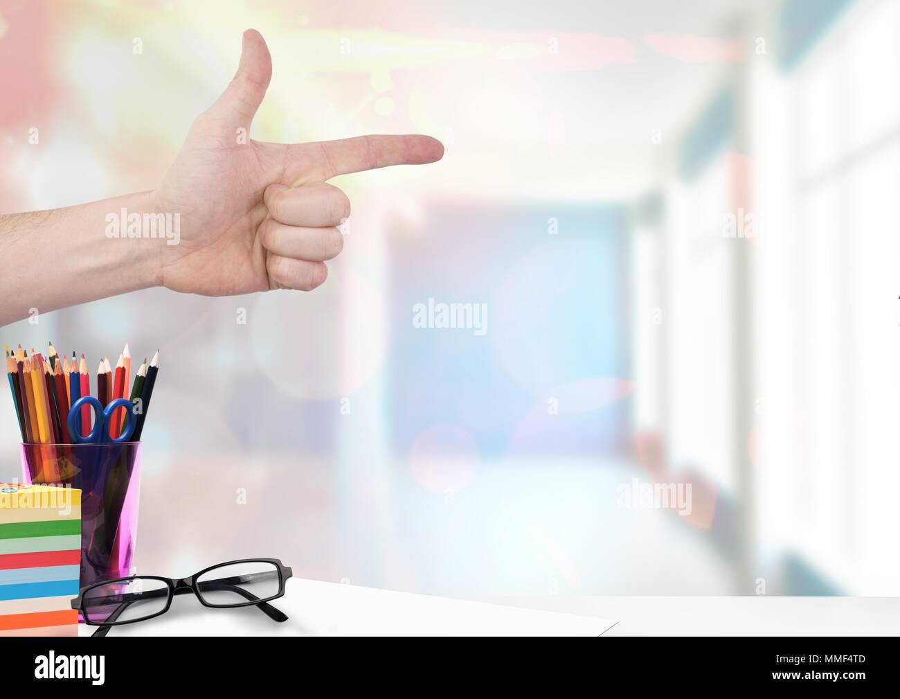 hand pointing with education objects Stock Photo - Alamy