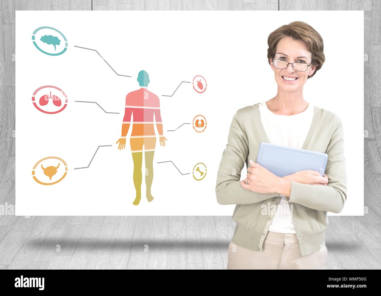 Educational human body chart on hanging card with teacher Stock Photo ...