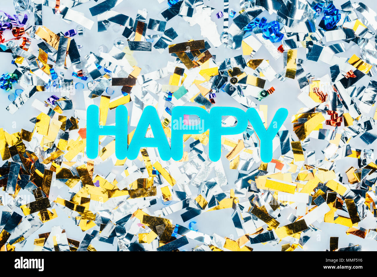 happy sign with colorful confetti Stock Photo - Alamy