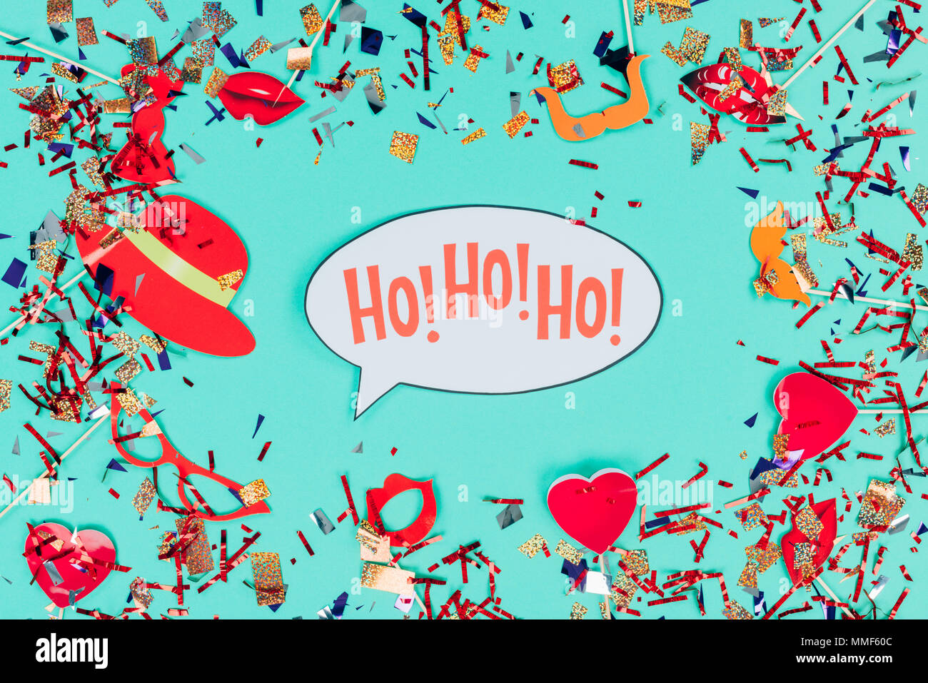 hohoho speach bubble with confetti Stock Photo - Alamy