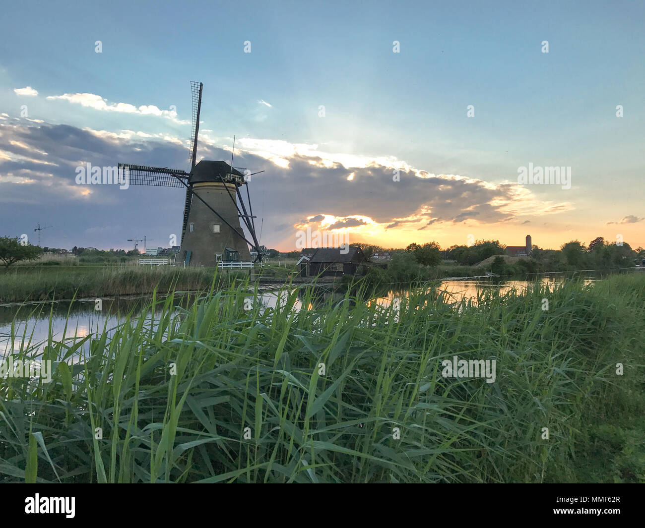 Beautiful dutch windmill landscape at the famous Kinderdijk canals ...