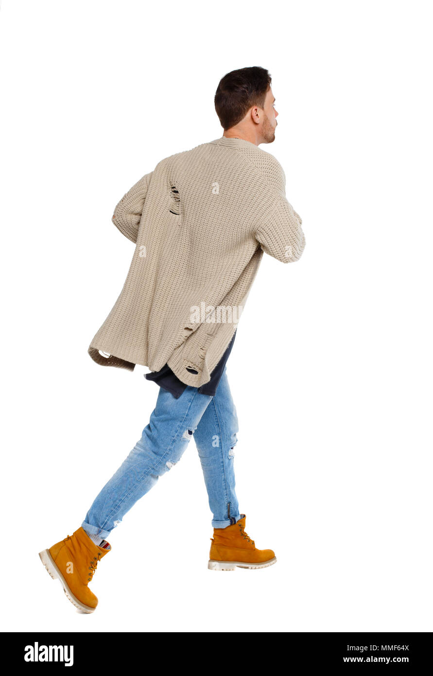 Back view of a running man in sweater. backside view of person. Rear ...
