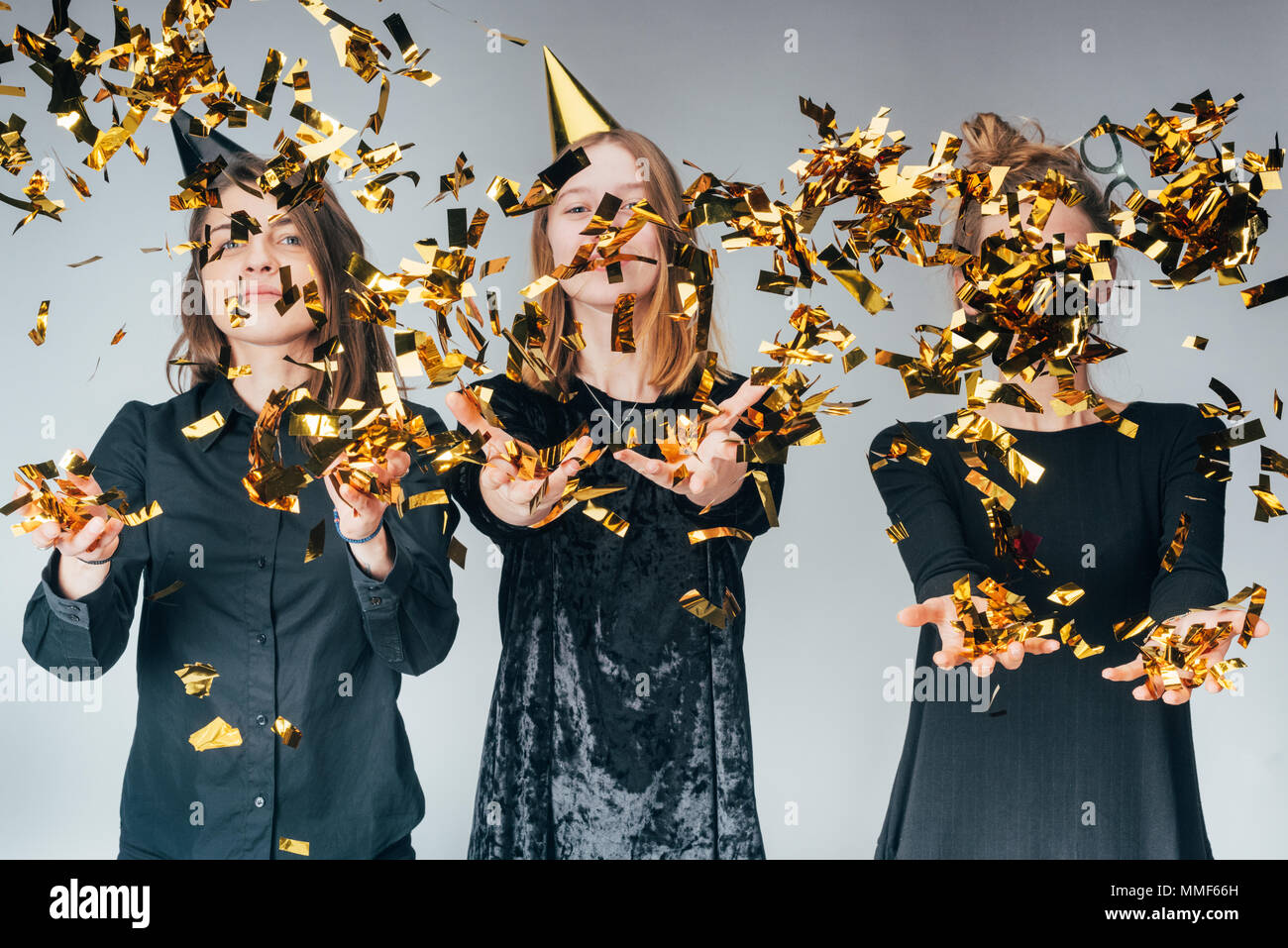 Friends throwing confetti birthday party hi-res stock photography and ...