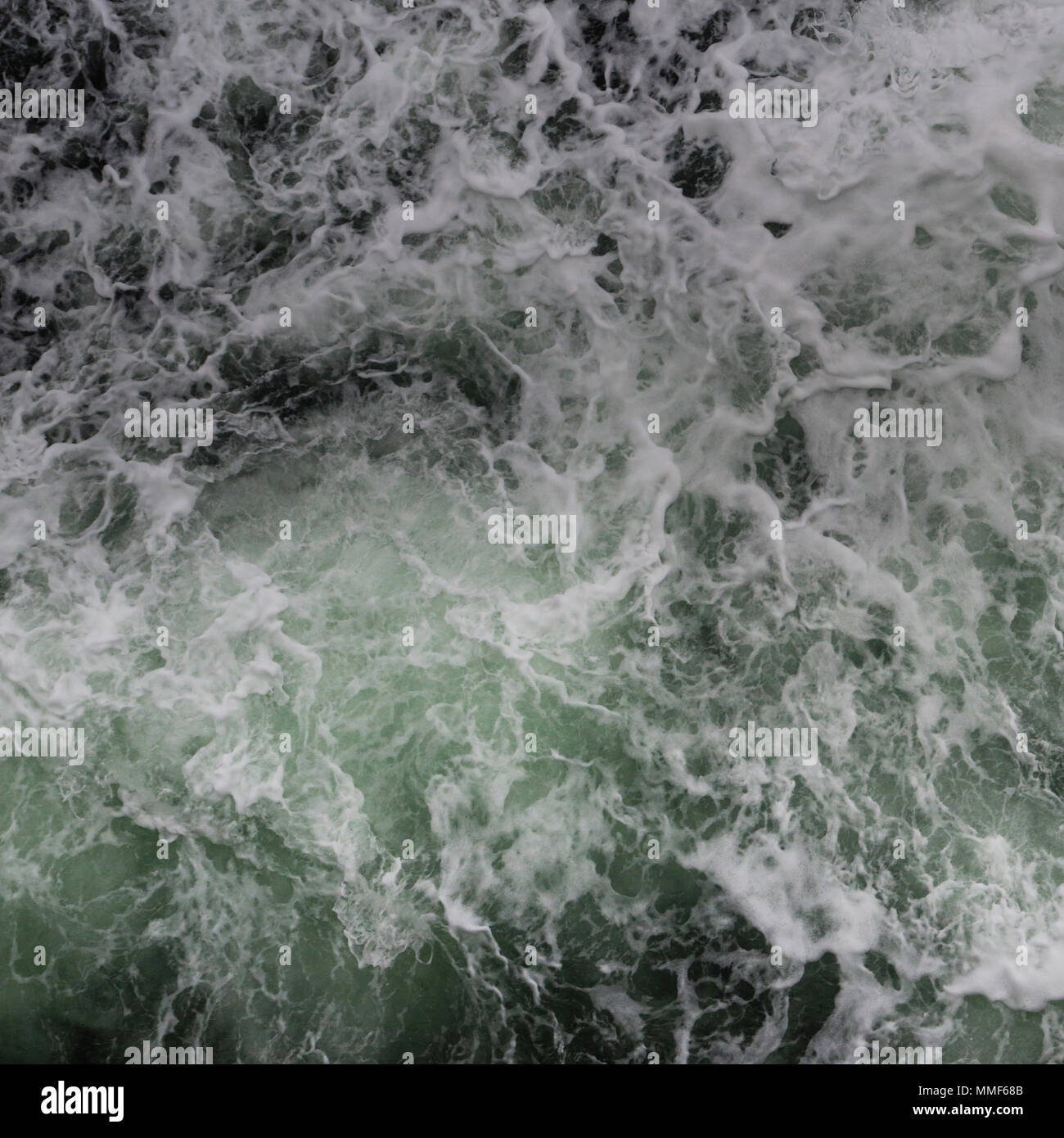 Big water splash seen from above a boat Stock Photo - Alamy