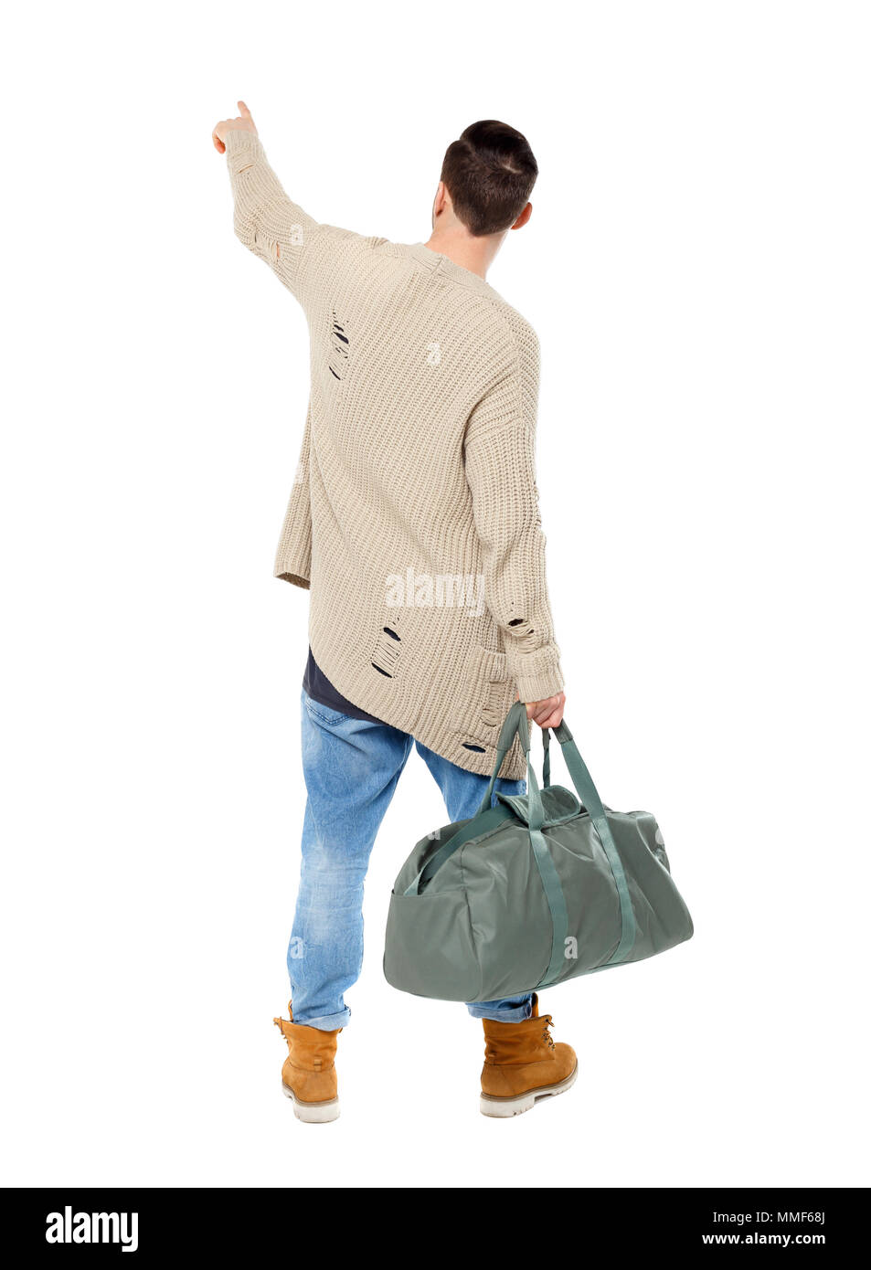 Back view of a man with a green bag pointing forward. backside view of ...