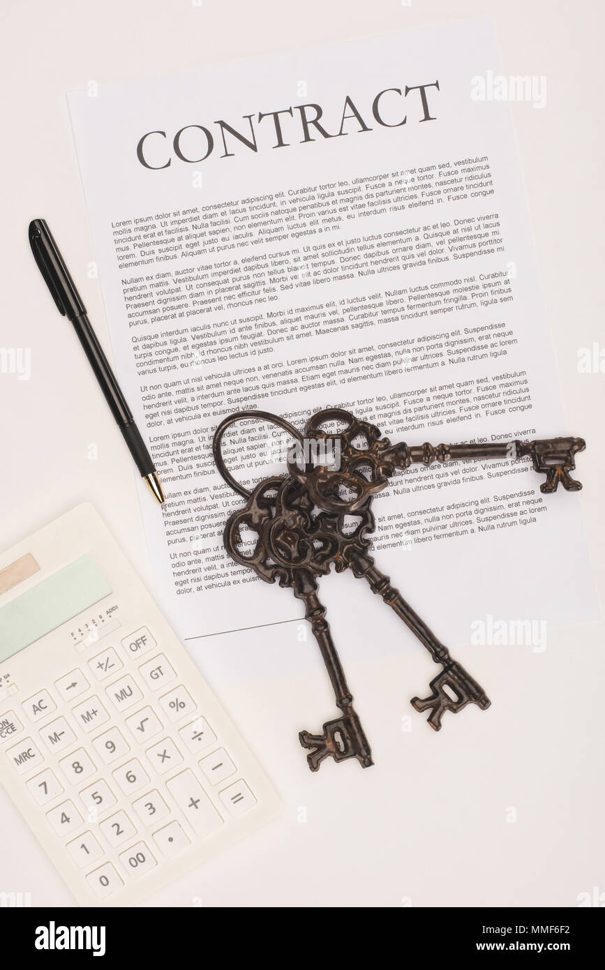 top view of contract with keys, house buying concept isolated on white ...
