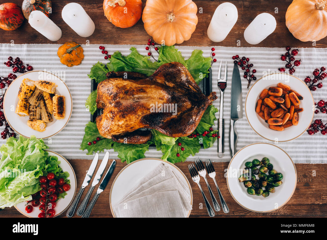 Baked turkey in middle of served table Stock Photo - Alamy