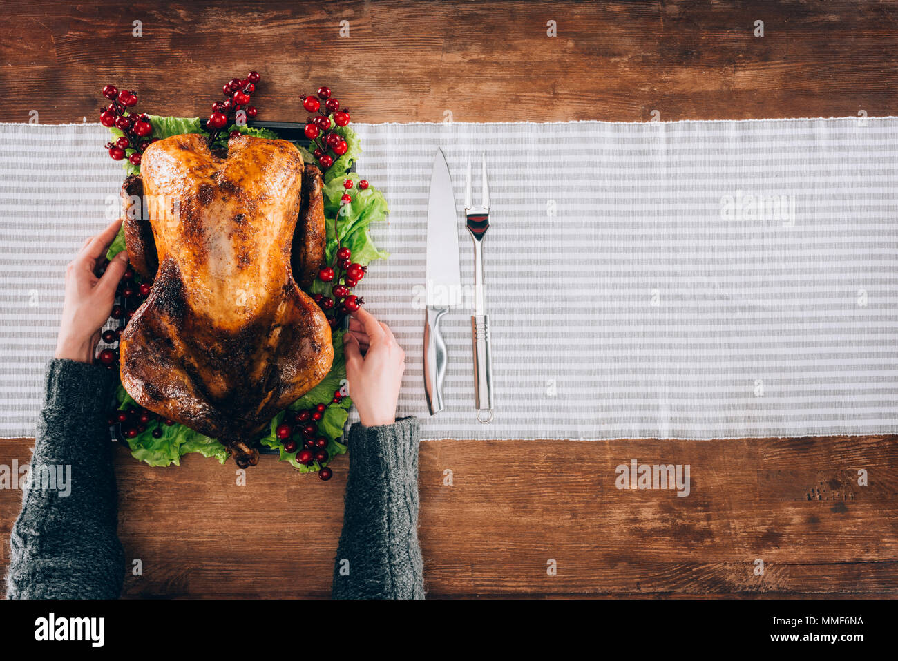 Man serving turkey for thanksgiving day Stock Photo - Alamy
