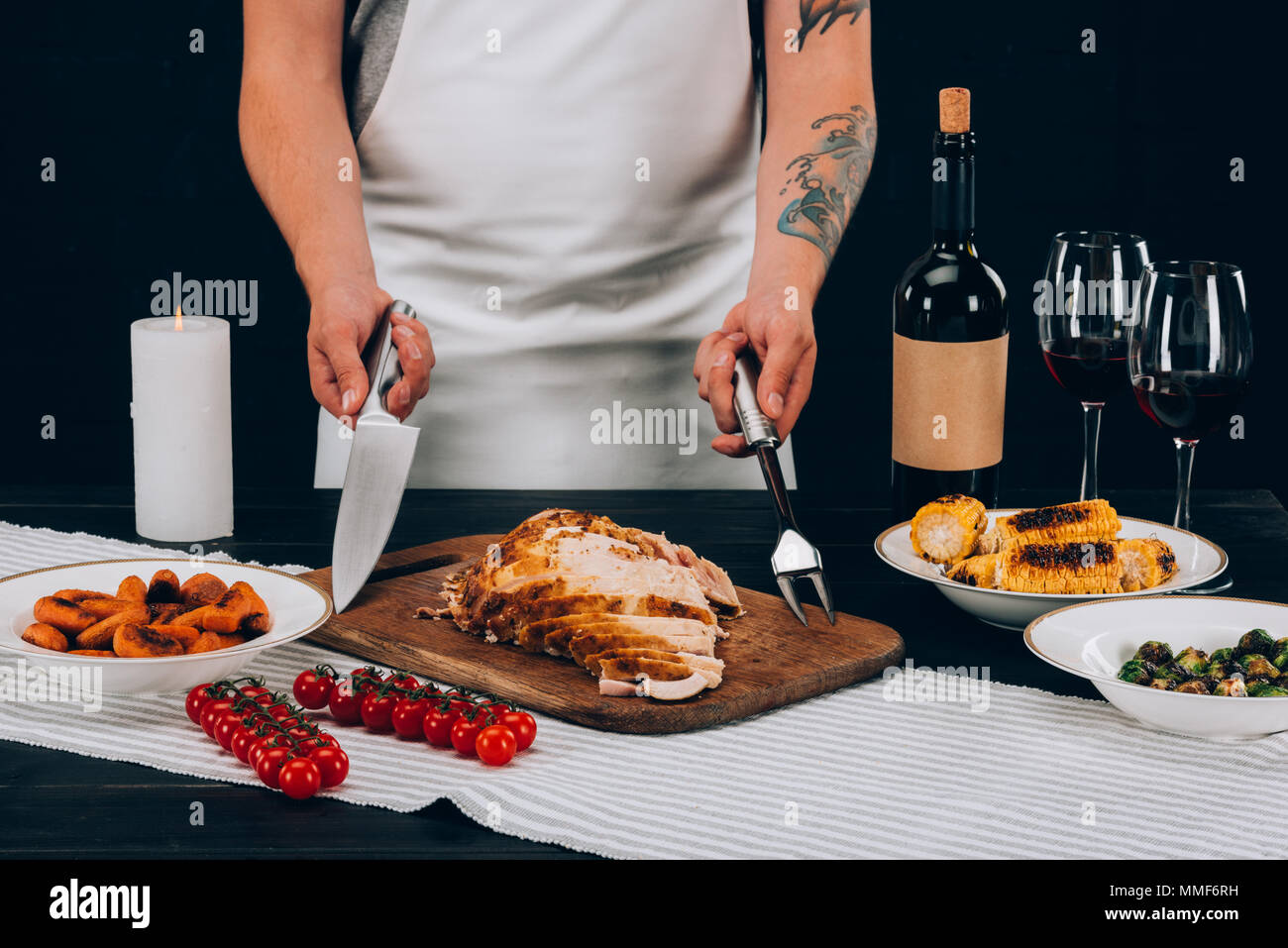 Hands holding knife and fork hi-res stock photography and images - Alamy
