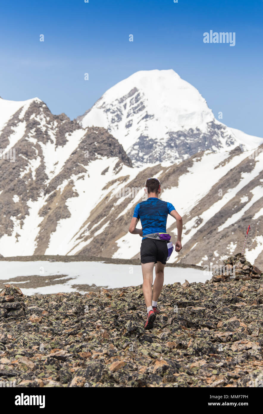 Trail runner, man and success in mountains. Running, sports, fitness ...