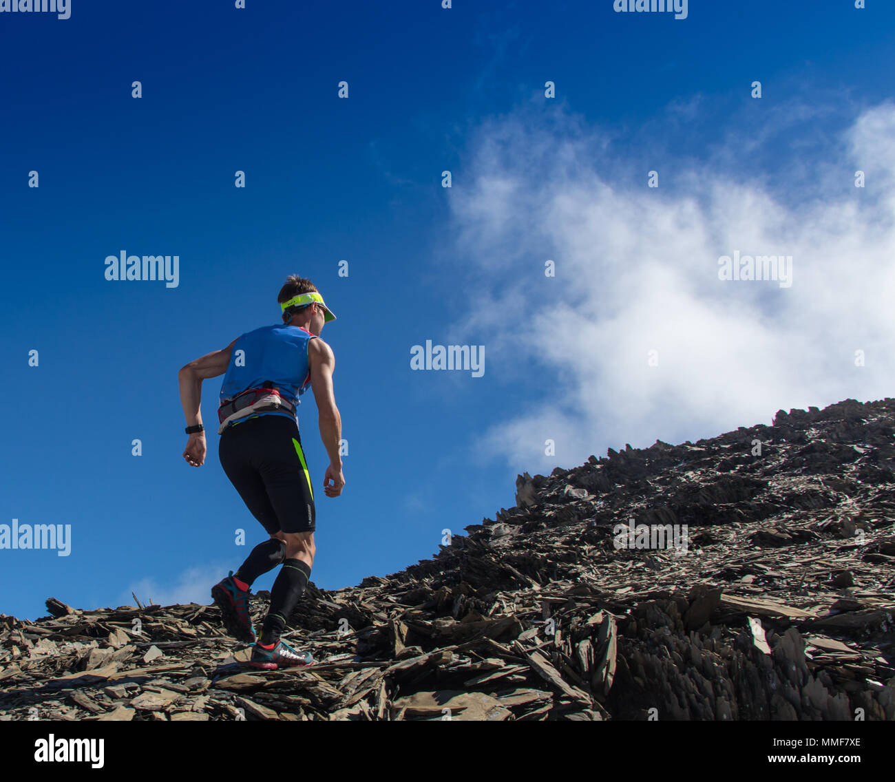 Young man jogging on rural road hi-res stock photography and images - Alamy