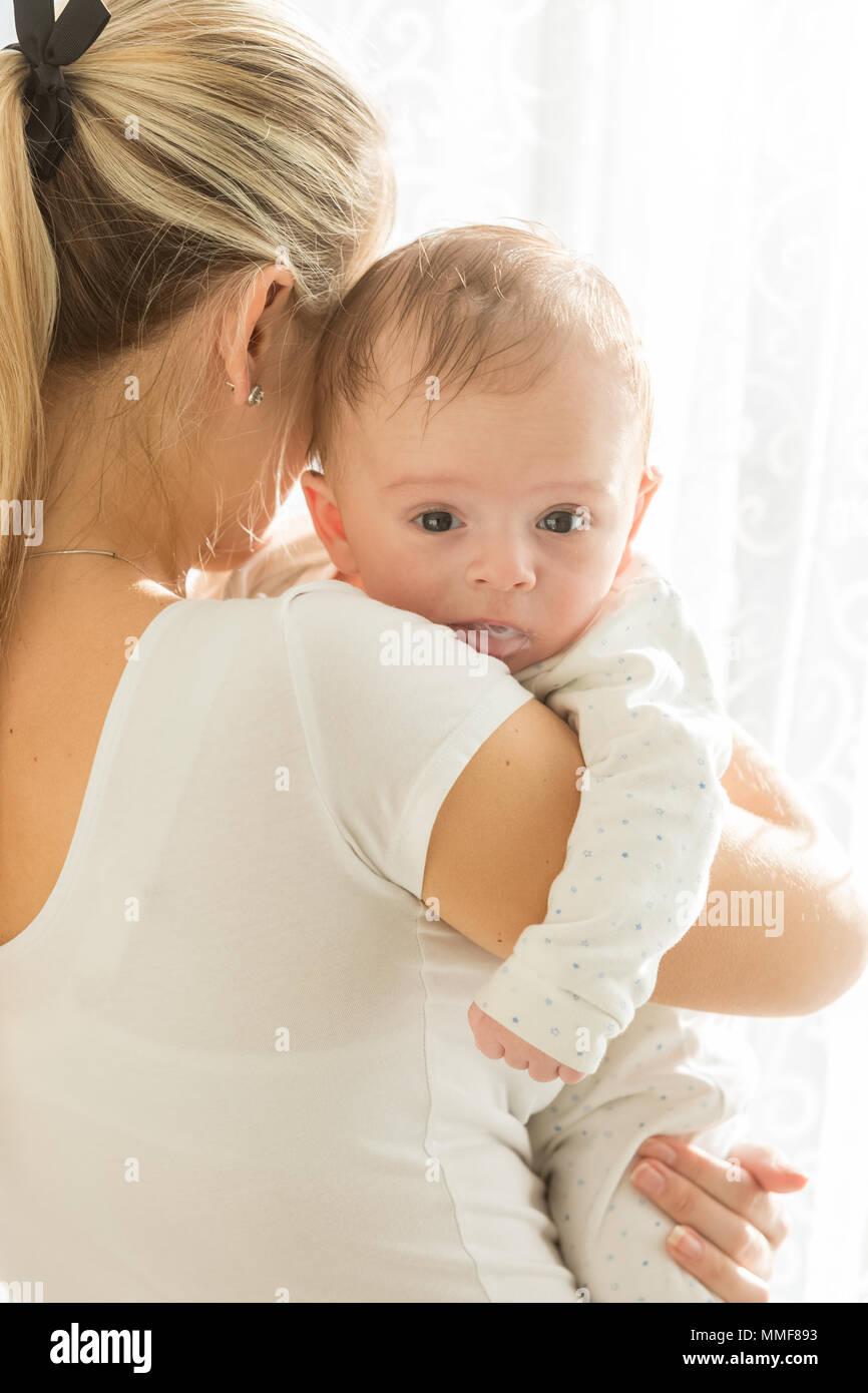 Portrait boy embracing baby girl hi-res stock photography and images ...