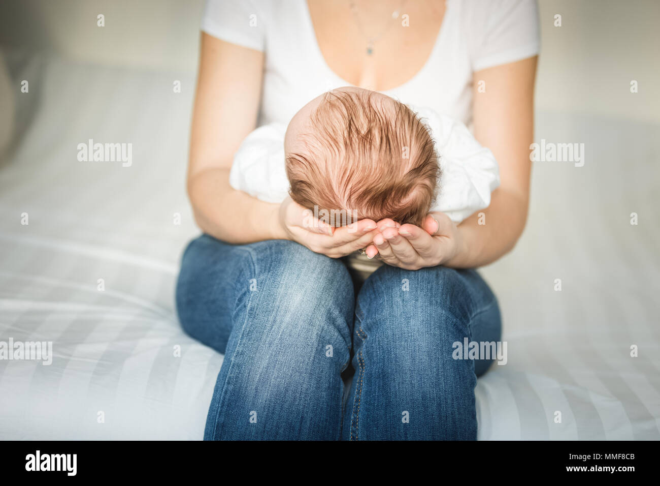 Tender mother son sleeping baby daughter hi-res stock photography and ...