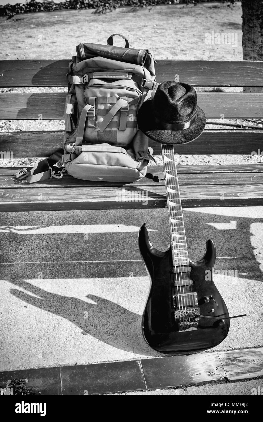 Free tramp lifestyle objects on a park bench Stock Photo - Alamy