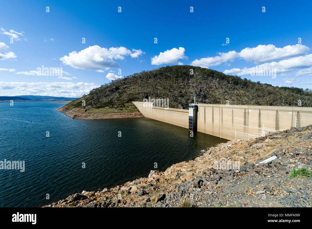 A manmade dam wall holding water for towns and cities Stock Photo - Alamy